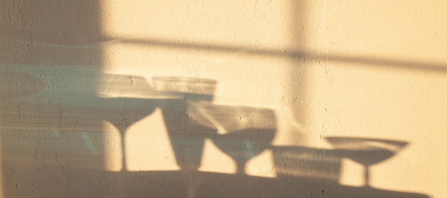 alcohol-shadows-on-wall - Tharros House